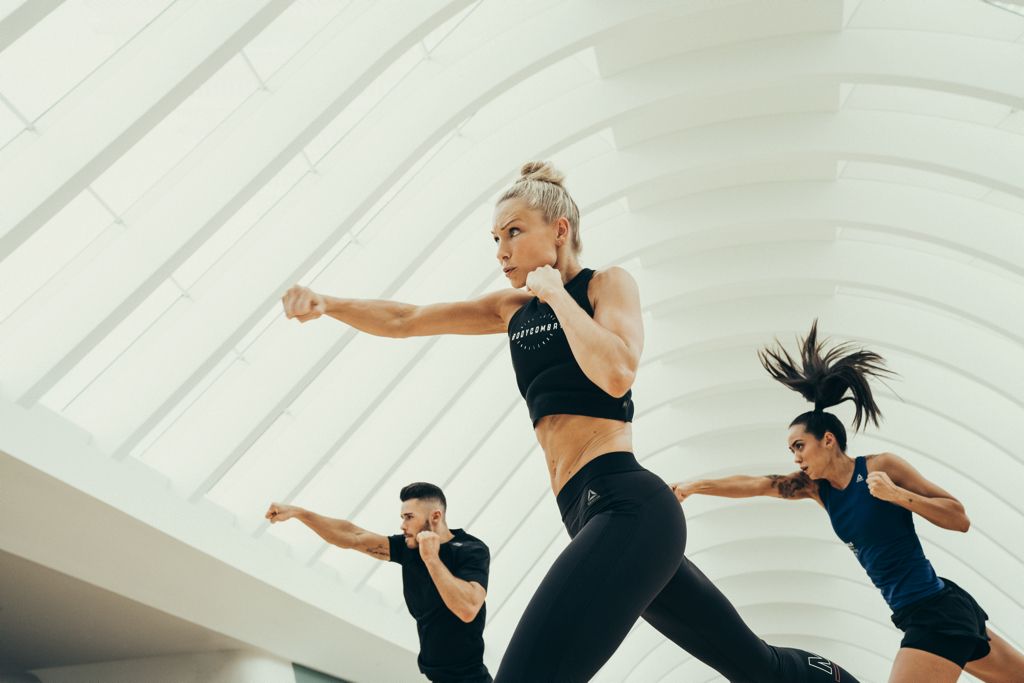 Exploring the Fitness Craze: Les Mills Body Combat | Kin Fix Health